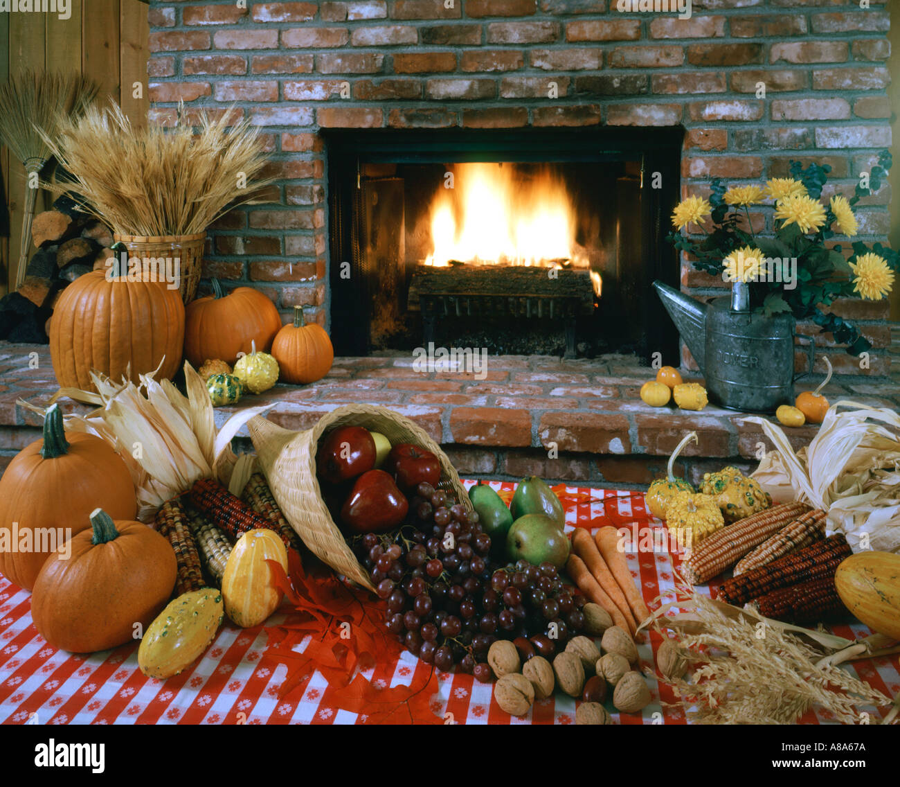 Harvest still life with blazing fireplace Stock Photo - Alamy