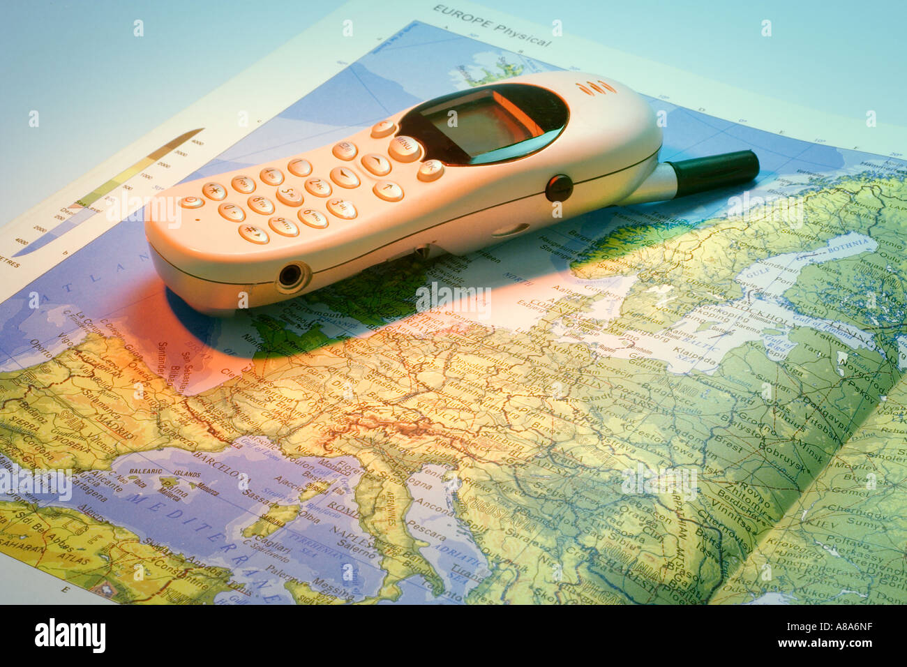 Mobile Phone and World Map Stock Photo - Alamy