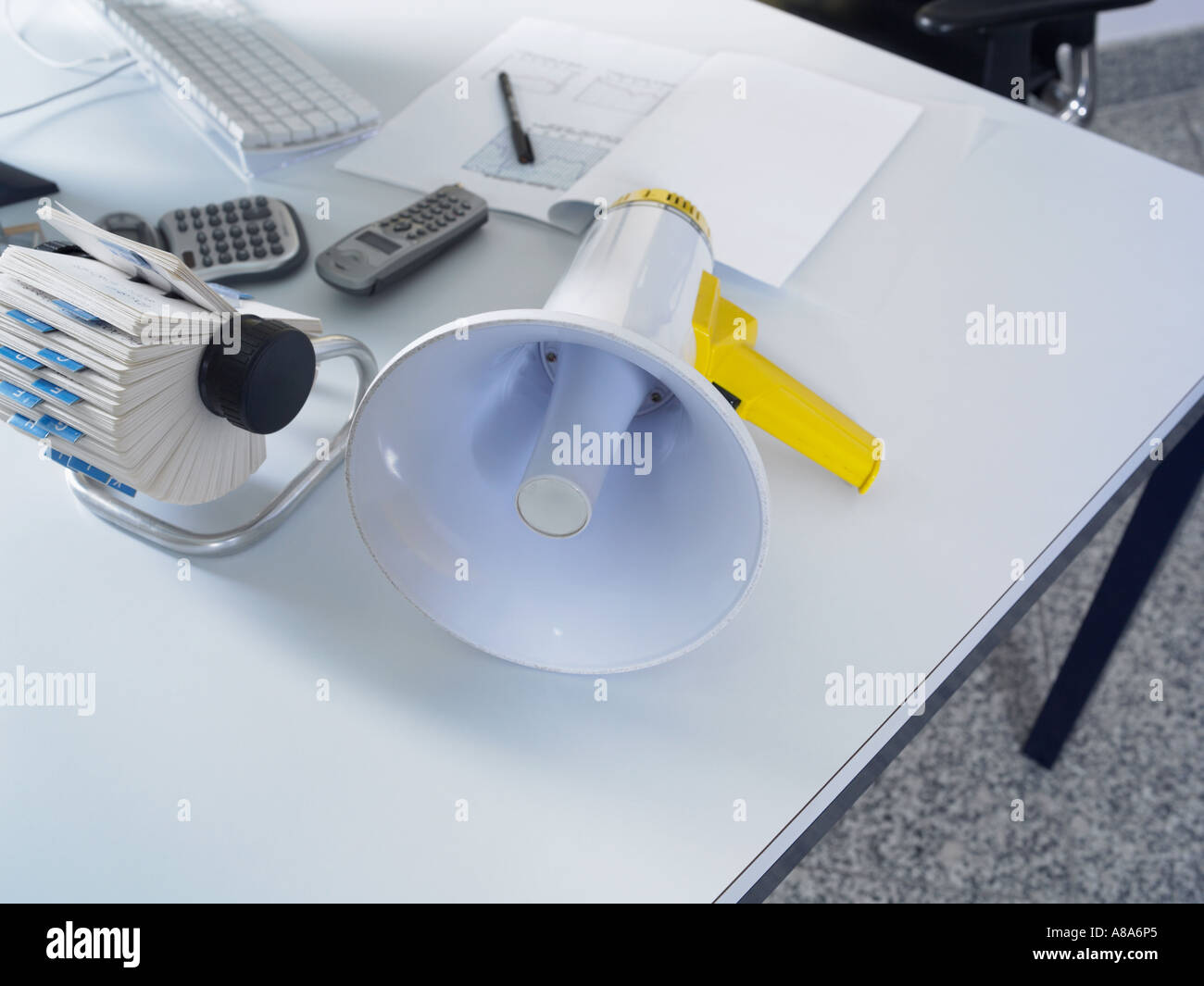 Megaphone on desk Stock Photo - Alamy