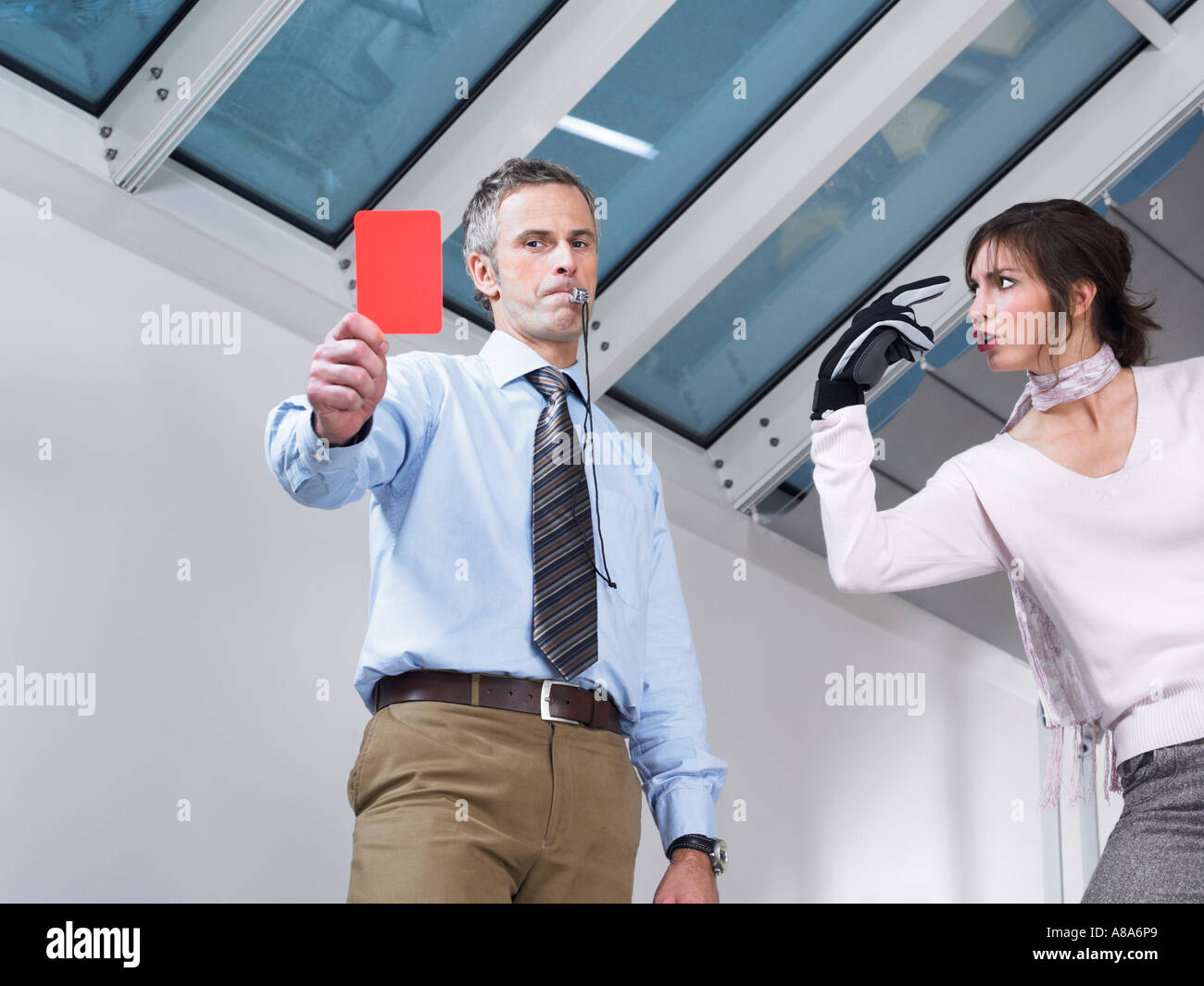 Manager with a red card Stock Photo - Alamy