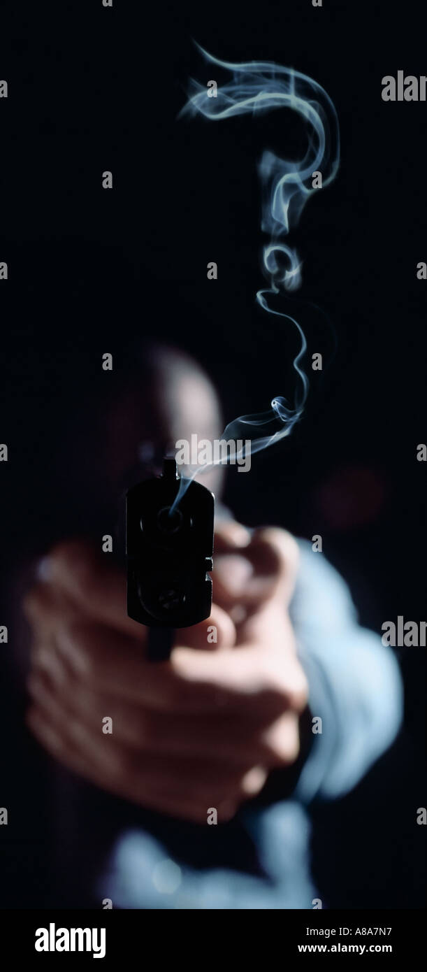 Question mark in gun smoke Stock Photo - Alamy