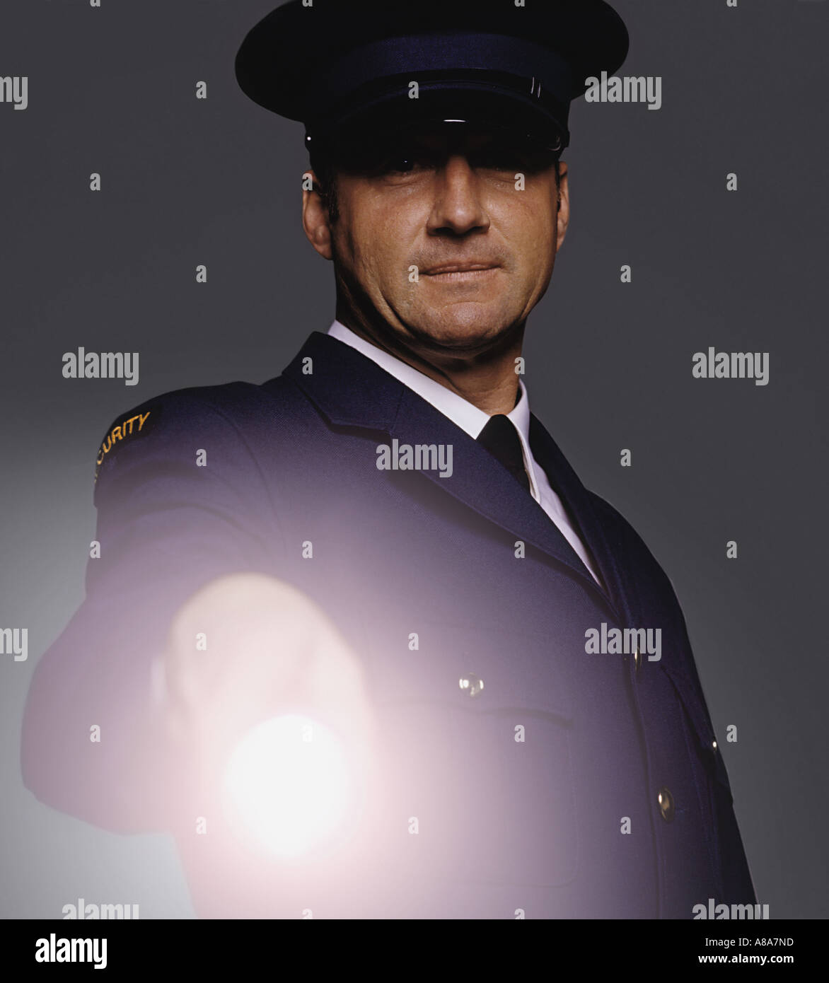 Security guard shining torch hi-res stock photography and images - Alamy