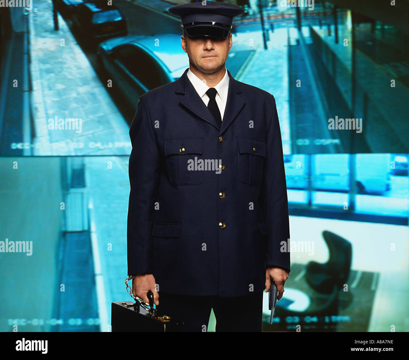Security guard handcuffed to briefcase Stock Photo - Alamy