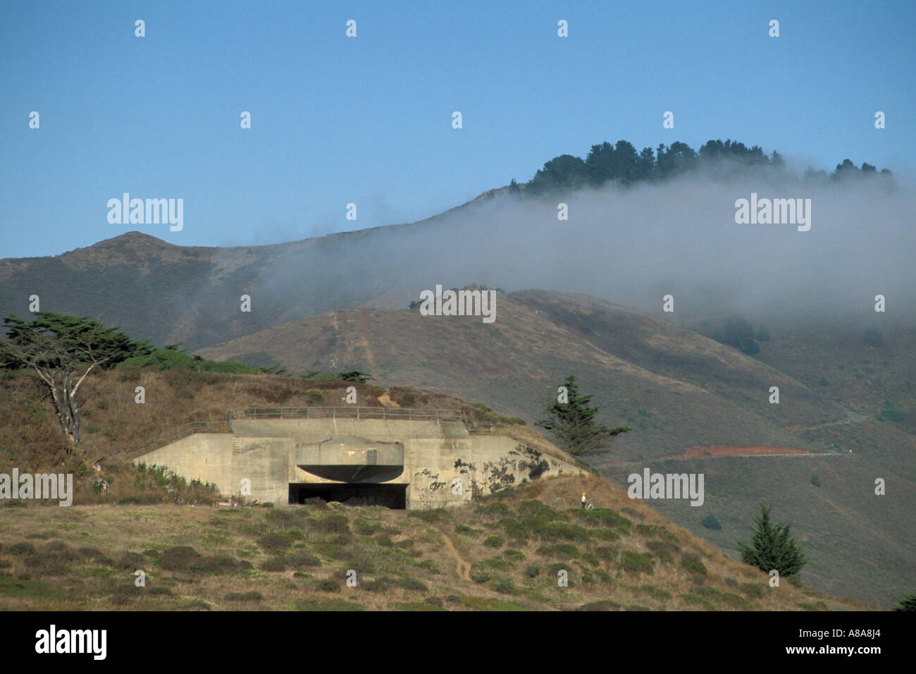 Coastal fog on hillside above old army gun battery near Rodeo Beach ...