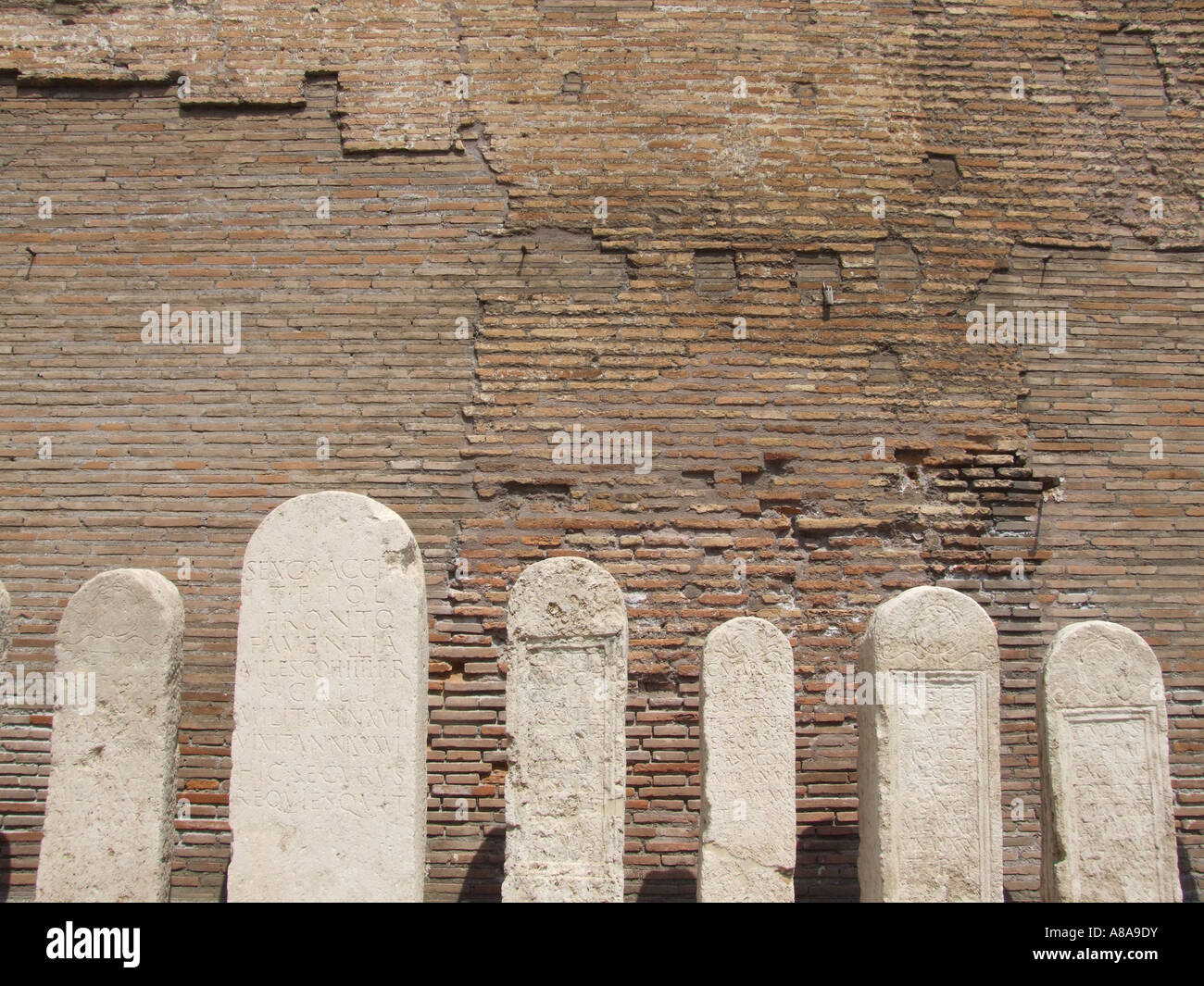 latin inscription on tomb stones at the diocletian baths museum in rome ...