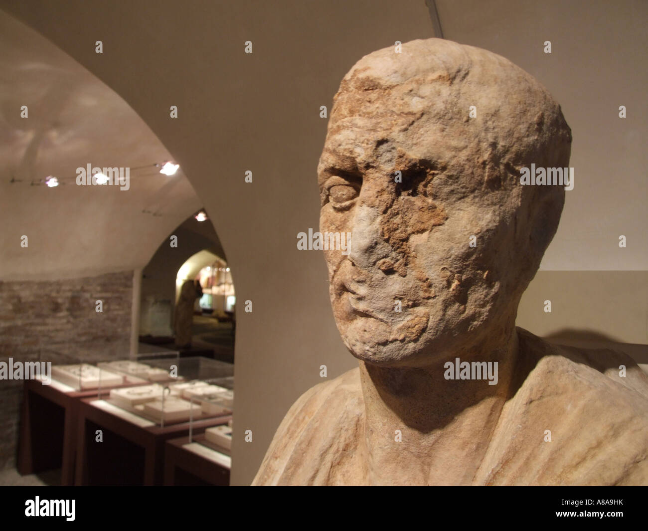damaged male statue in a museum in rome Stock Photo - Alamy