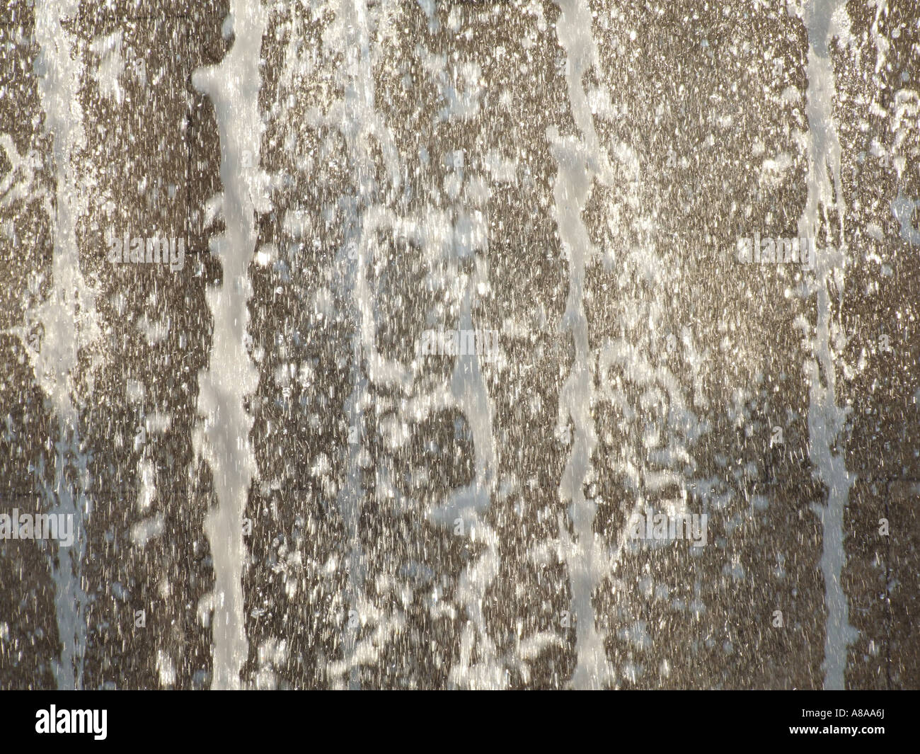 Backlit water drops from spray hi-res stock photography and images - Alamy