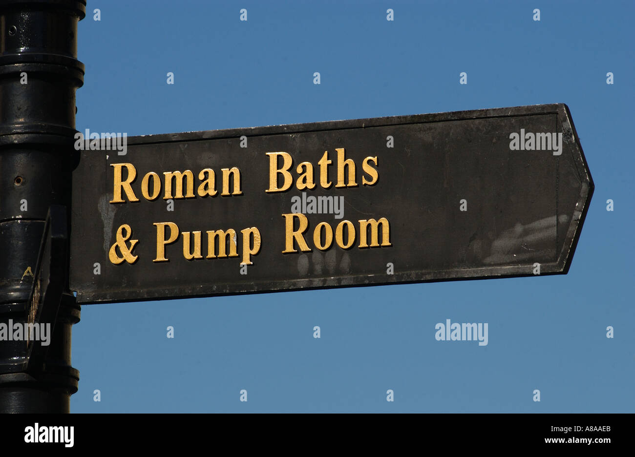 Bath Street Sign pointing to the Roman Baths and Pump Room Stock Photo ...