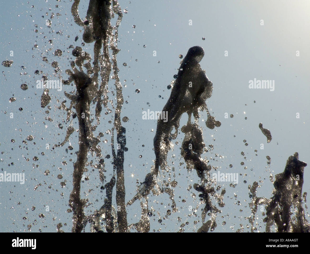 Backlit water drops from spray hi-res stock photography and images - Alamy