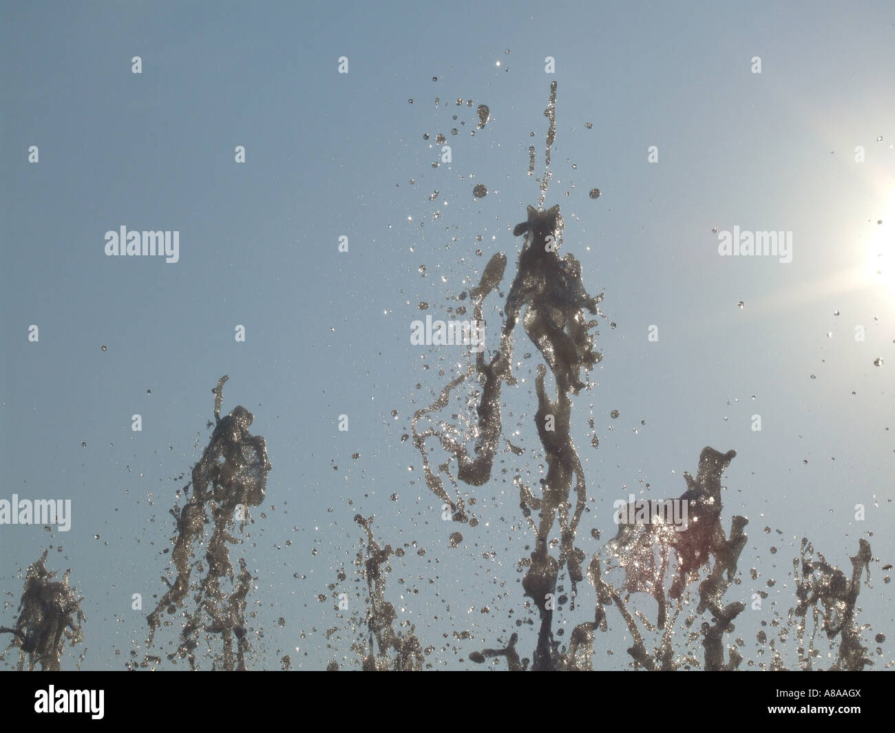 Backlit water drops from spray hi-res stock photography and images - Alamy