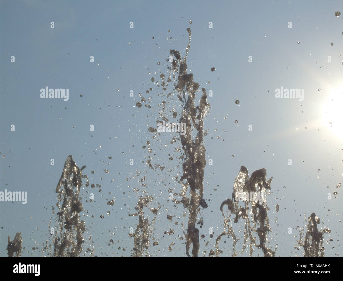 Backlit water drops from spray hi-res stock photography and images - Alamy