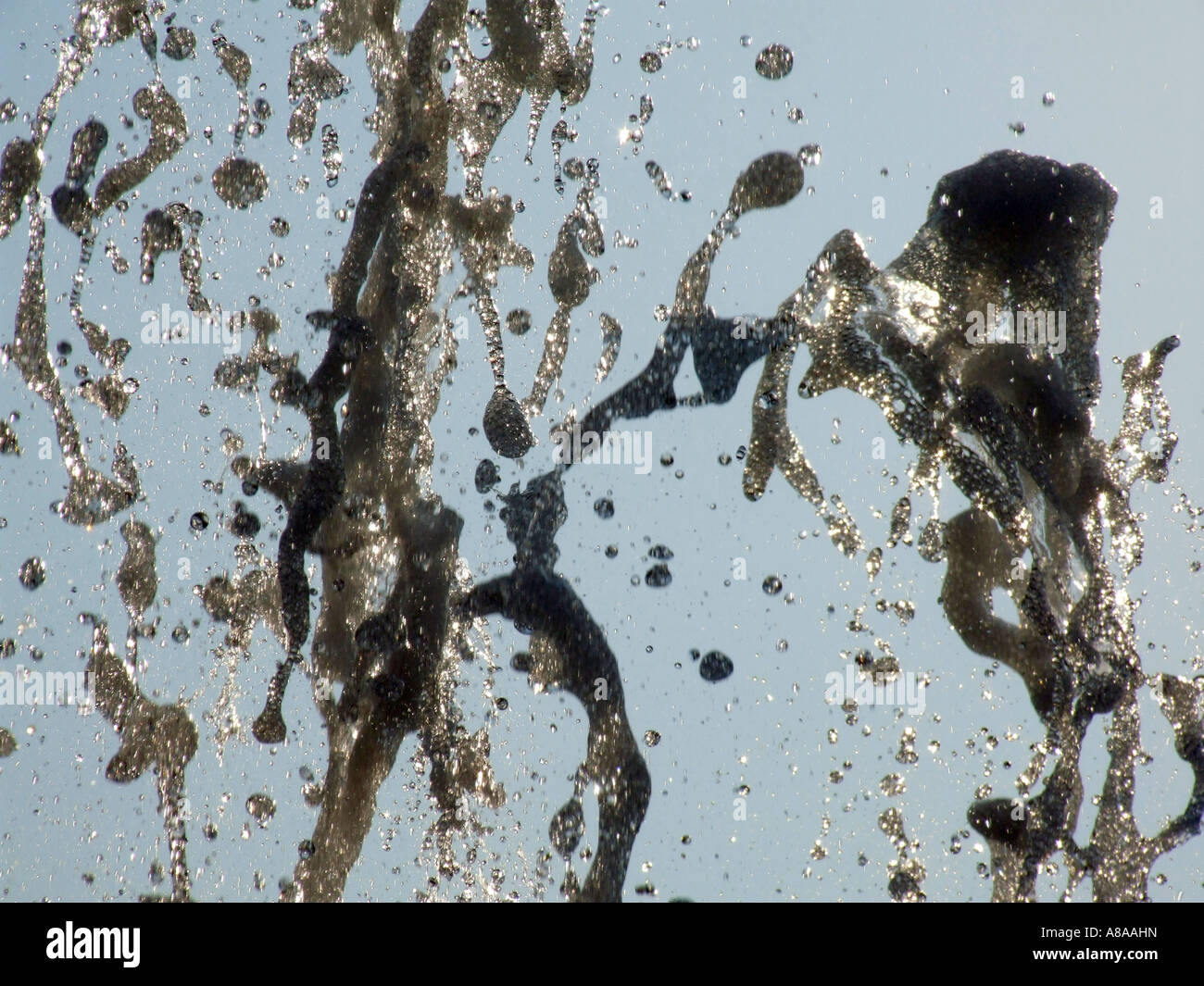 Backlit water drops from spray hi-res stock photography and images - Alamy