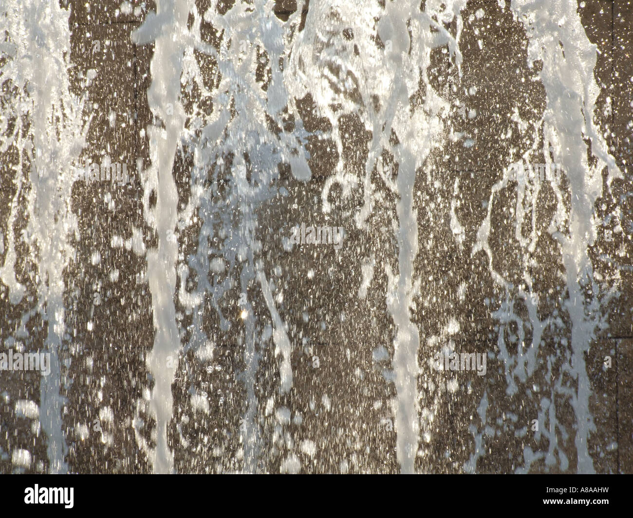 Backlit water drops from spray hi-res stock photography and images - Alamy
