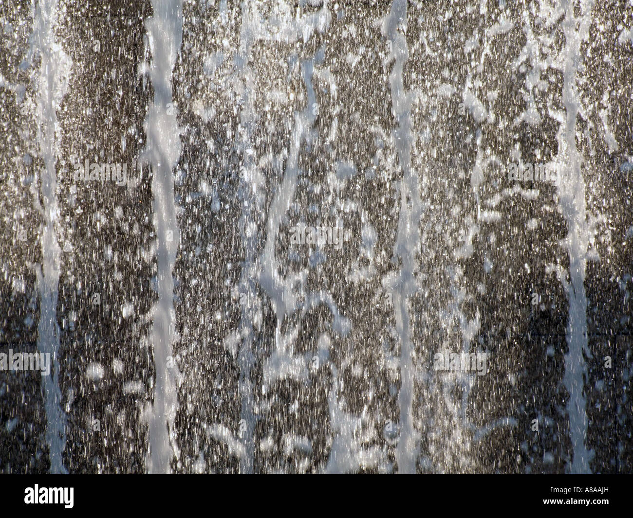 Backlit water drops from spray hi-res stock photography and images - Alamy