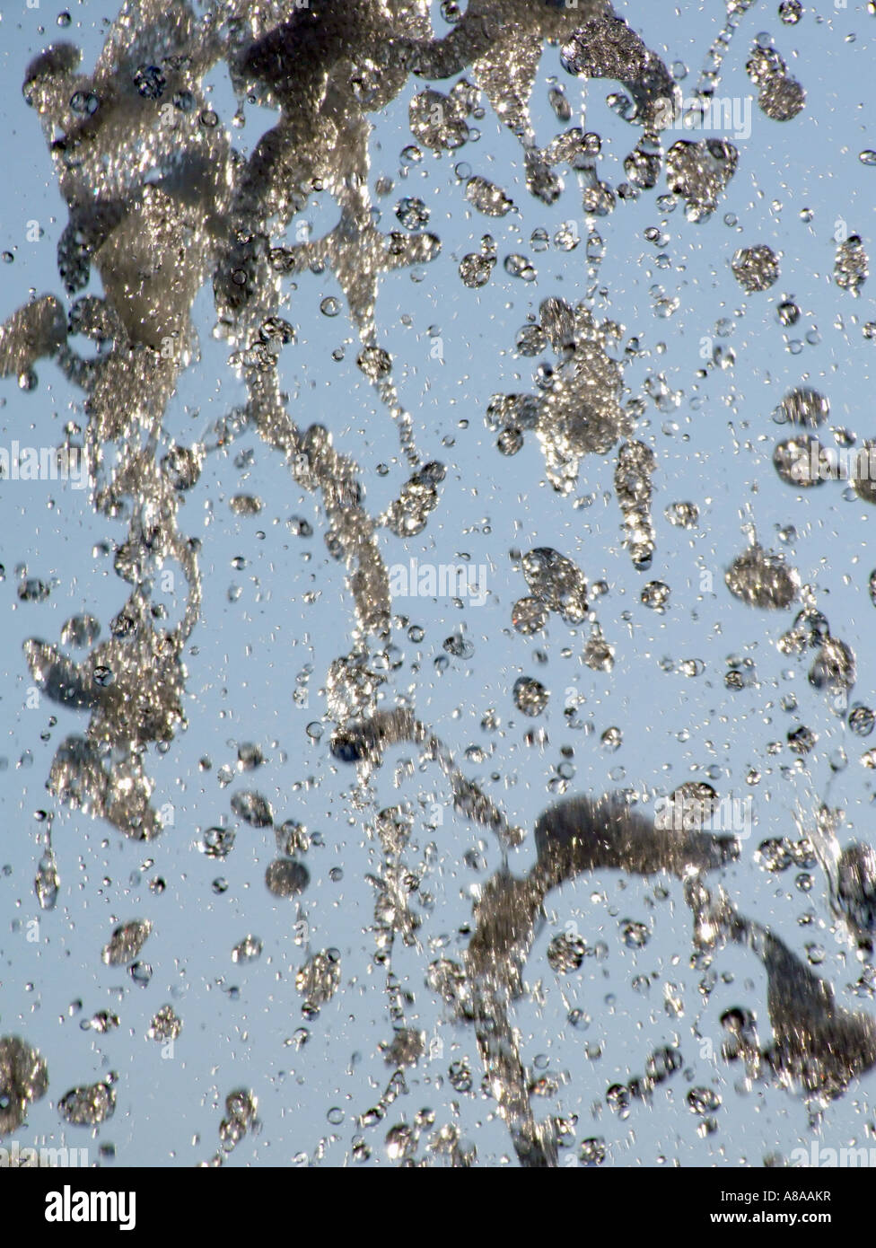 Backlit water drops from spray hi-res stock photography and images - Alamy