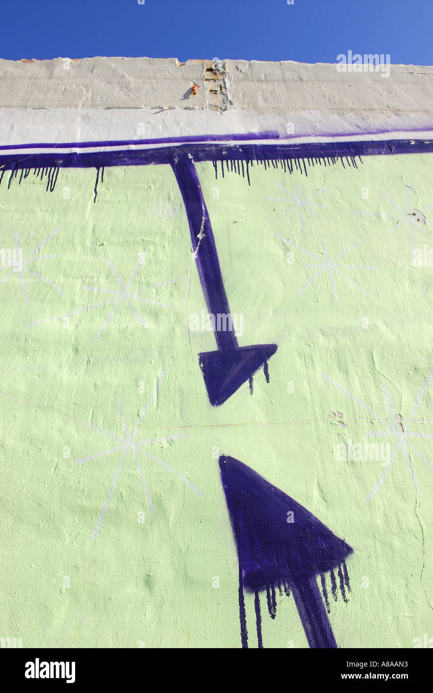 ARROWS ON WALL Stock Photo - Alamy