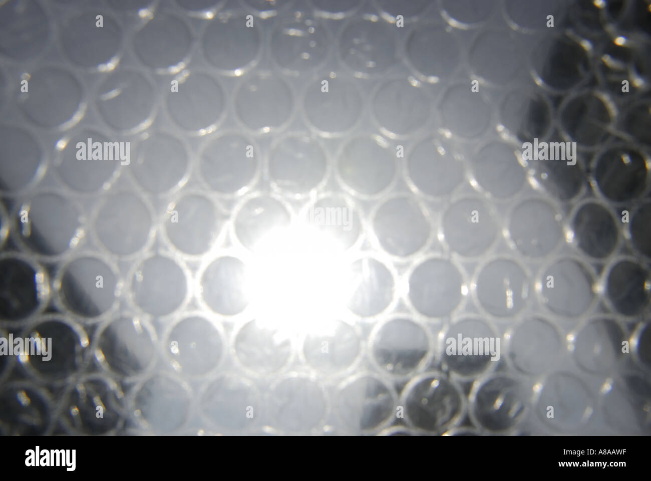 SUN THROUGH PLASTIC Stock Photo - Alamy