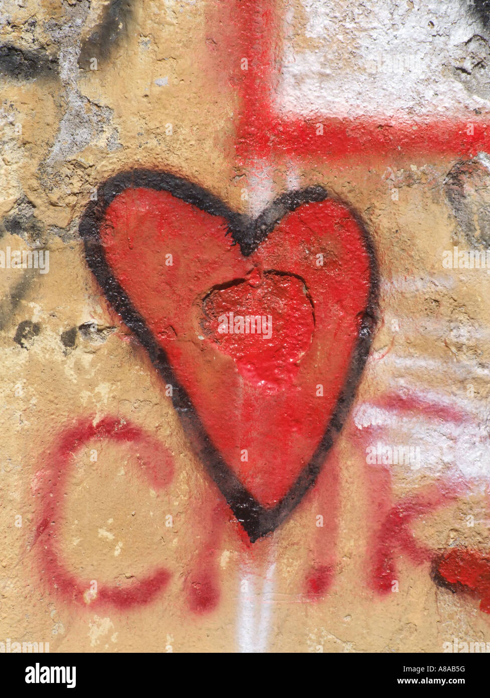 red heart painted on wall Stock Photo - Alamy