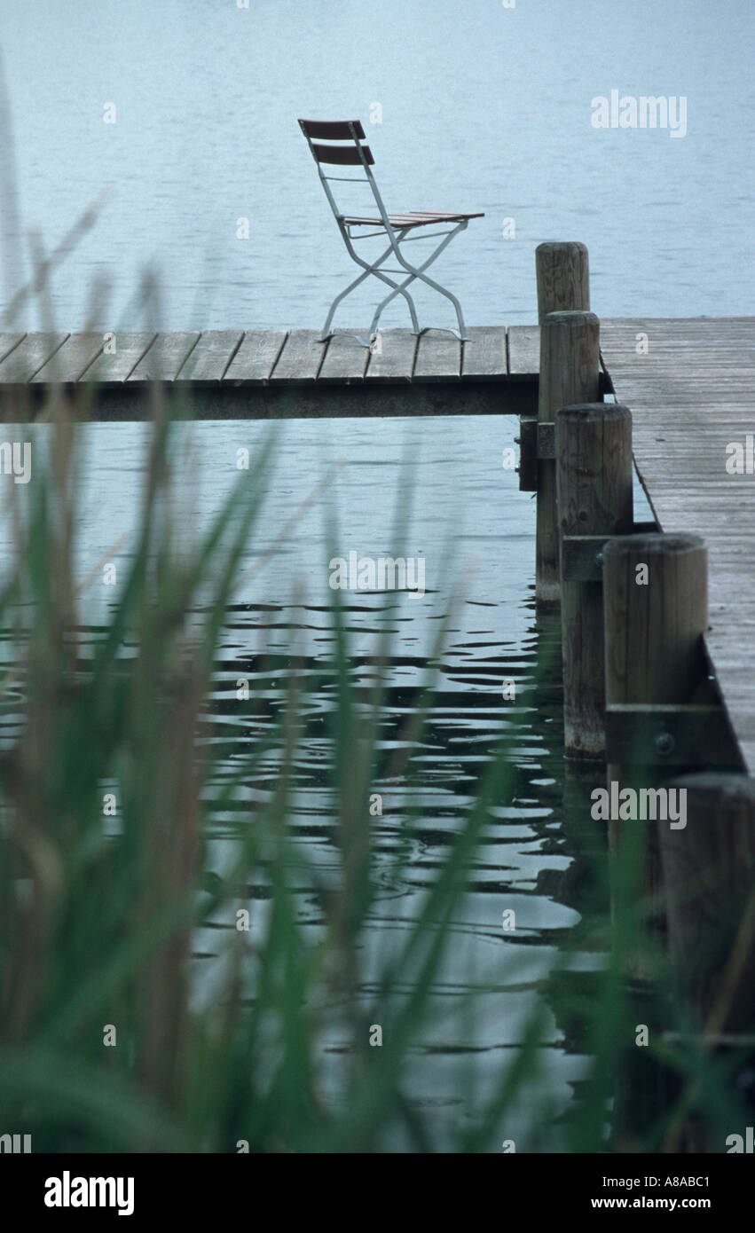 Lonely empty chair at Kirchseeon Lake in Bavaria Germany Stock Photo ...