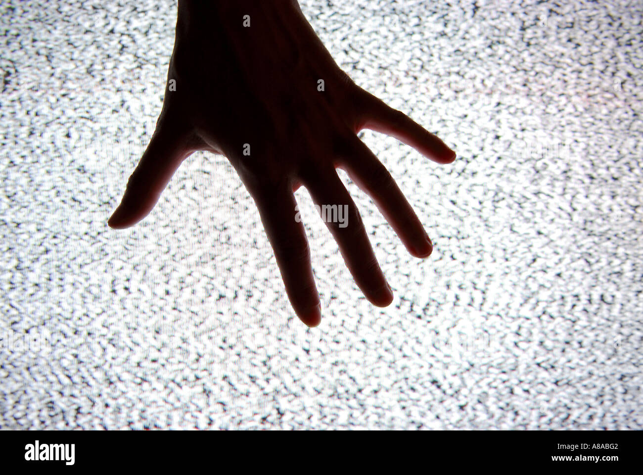 HAND ON TV SCREEN Stock Photo - Alamy