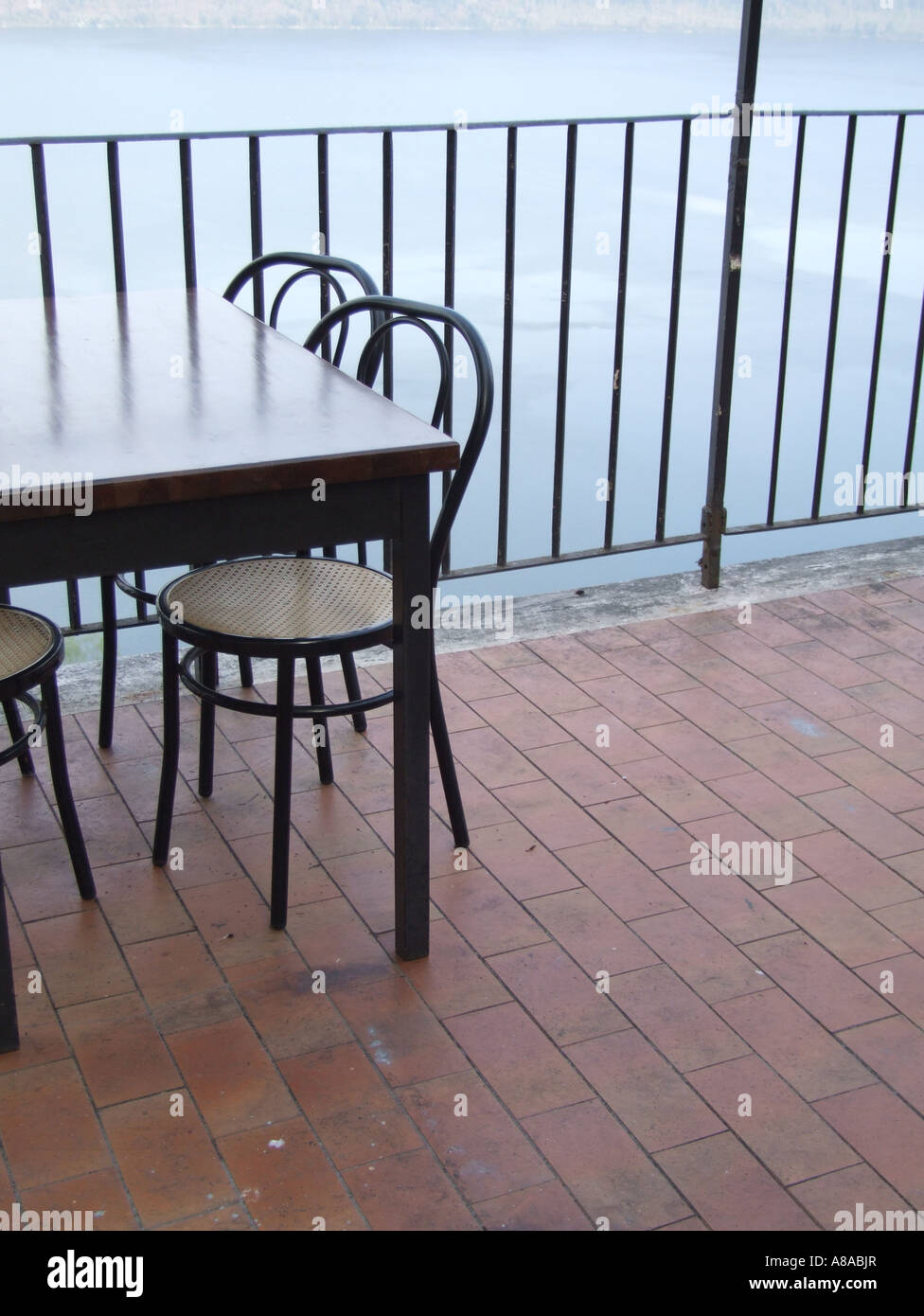 empty chair and table on terrace Stock Photo - Alamy