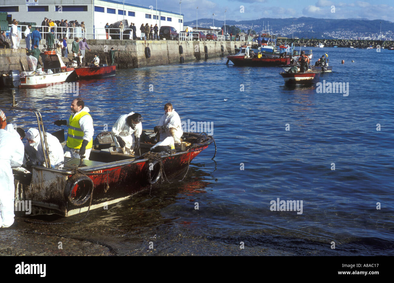 PRESTIGE OIL SPILL Small fishing boat used to recover oil is cleaned ...