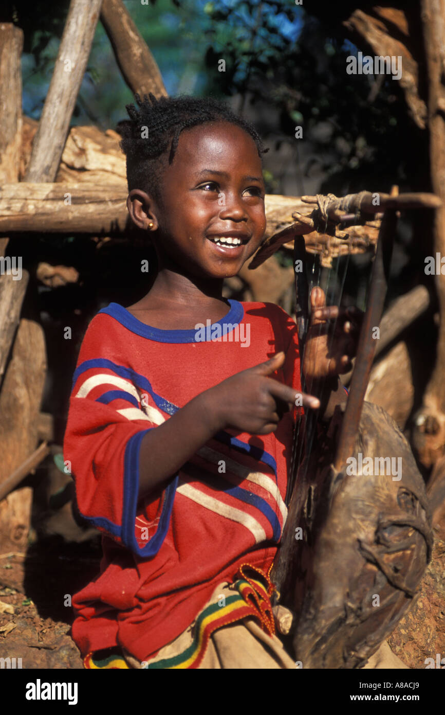 African children playing instrument hi-res stock photography and images ...