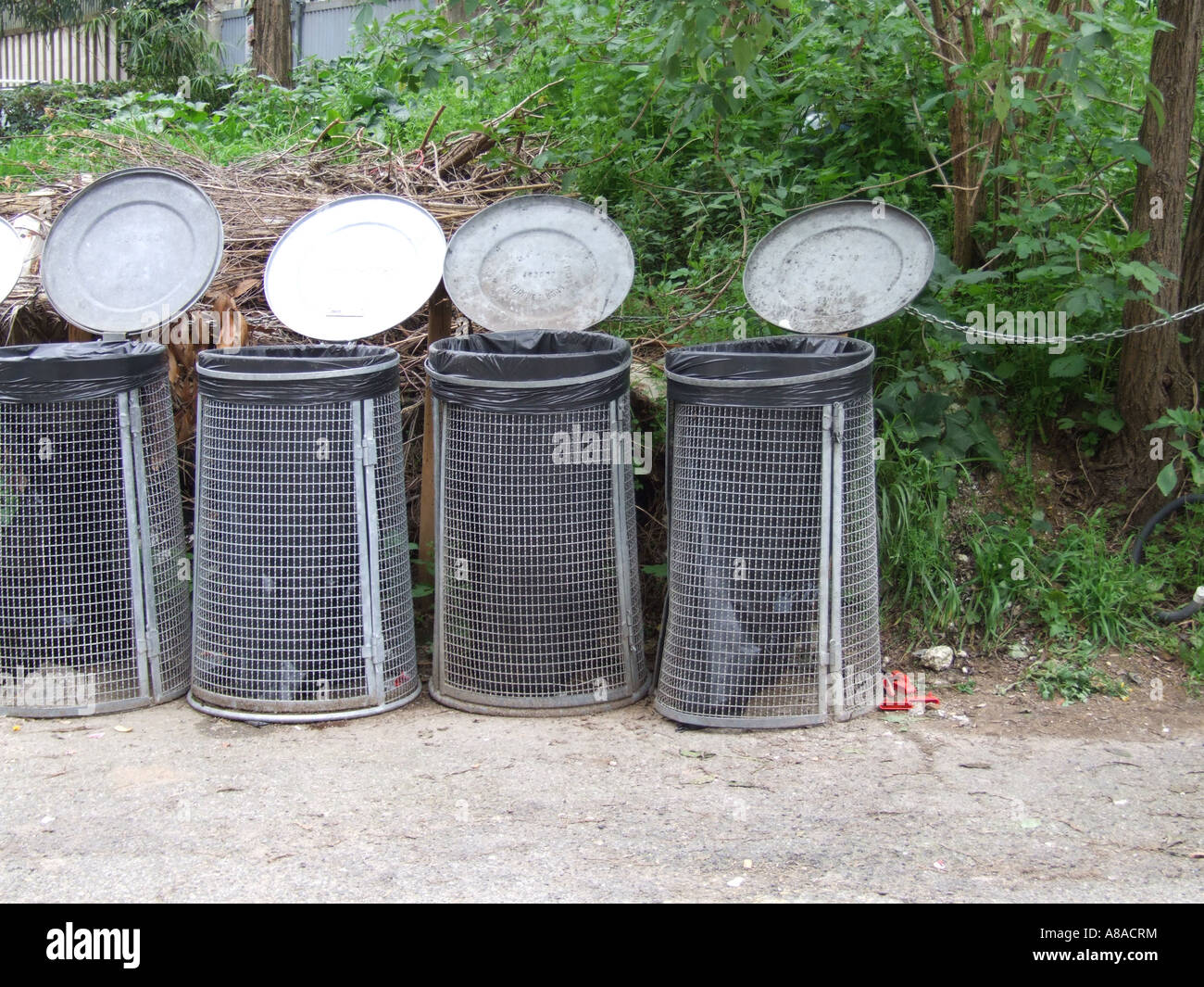 rubbish bins in town Stock Photo - Alamy