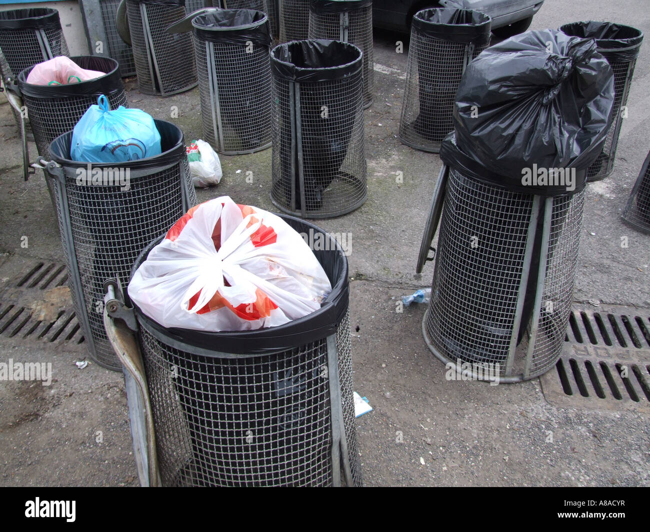rubbish bins in town Stock Photo - Alamy