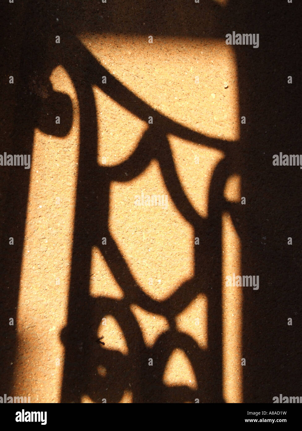 gate shadow on wall Stock Photo - Alamy