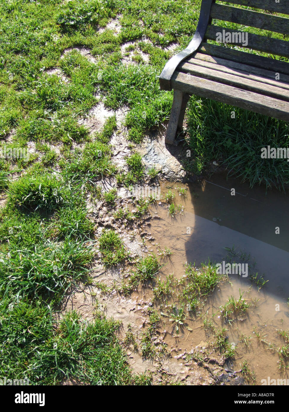 park bench in mud Stock Photo - Alamy