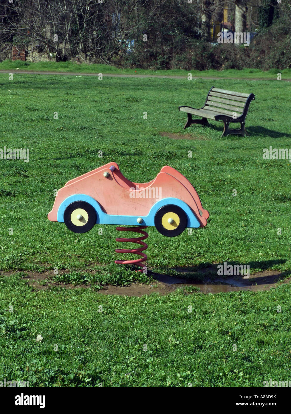 red playground toy car ride Stock Photo - Alamy