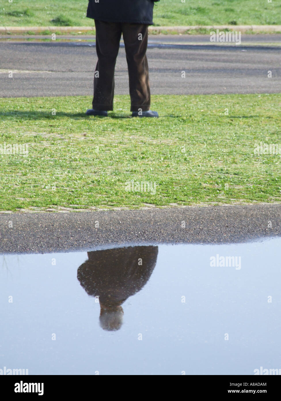 man's reflection in pool of water Stock Photo - Alamy