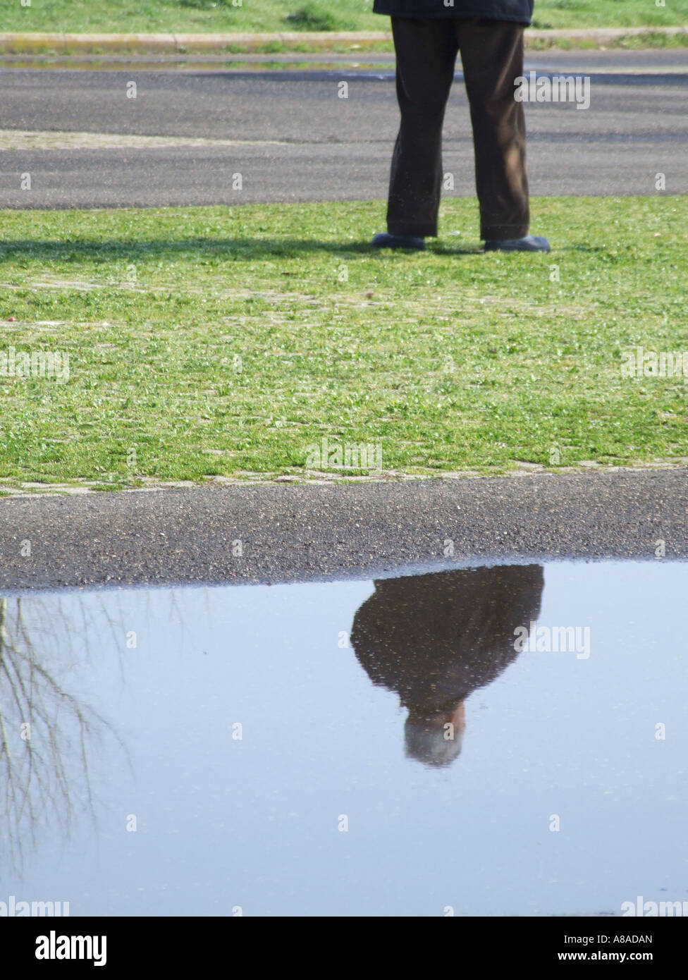 man's reflection in pool of water Stock Photo - Alamy