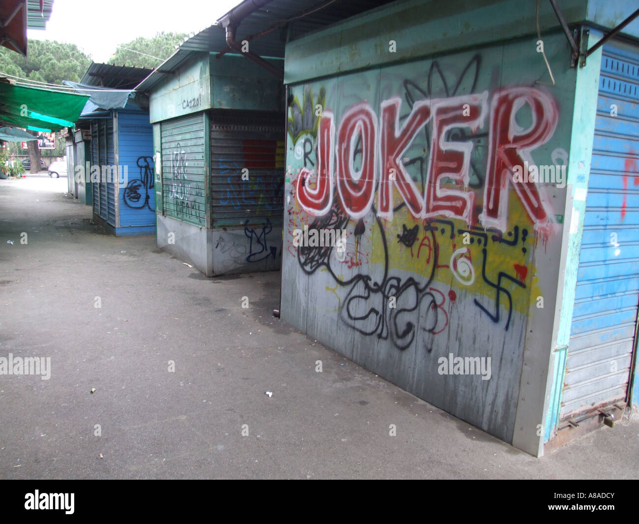 graffiti on close market stall shutter Stock Photo - Alamy