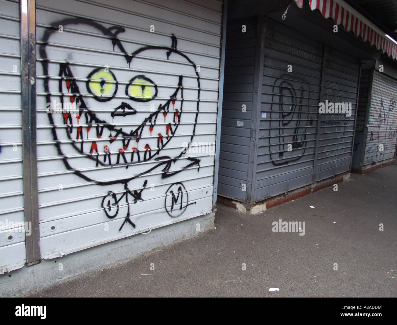 Graffiti Face On Shutter High Resolution Stock Photography and Images ...