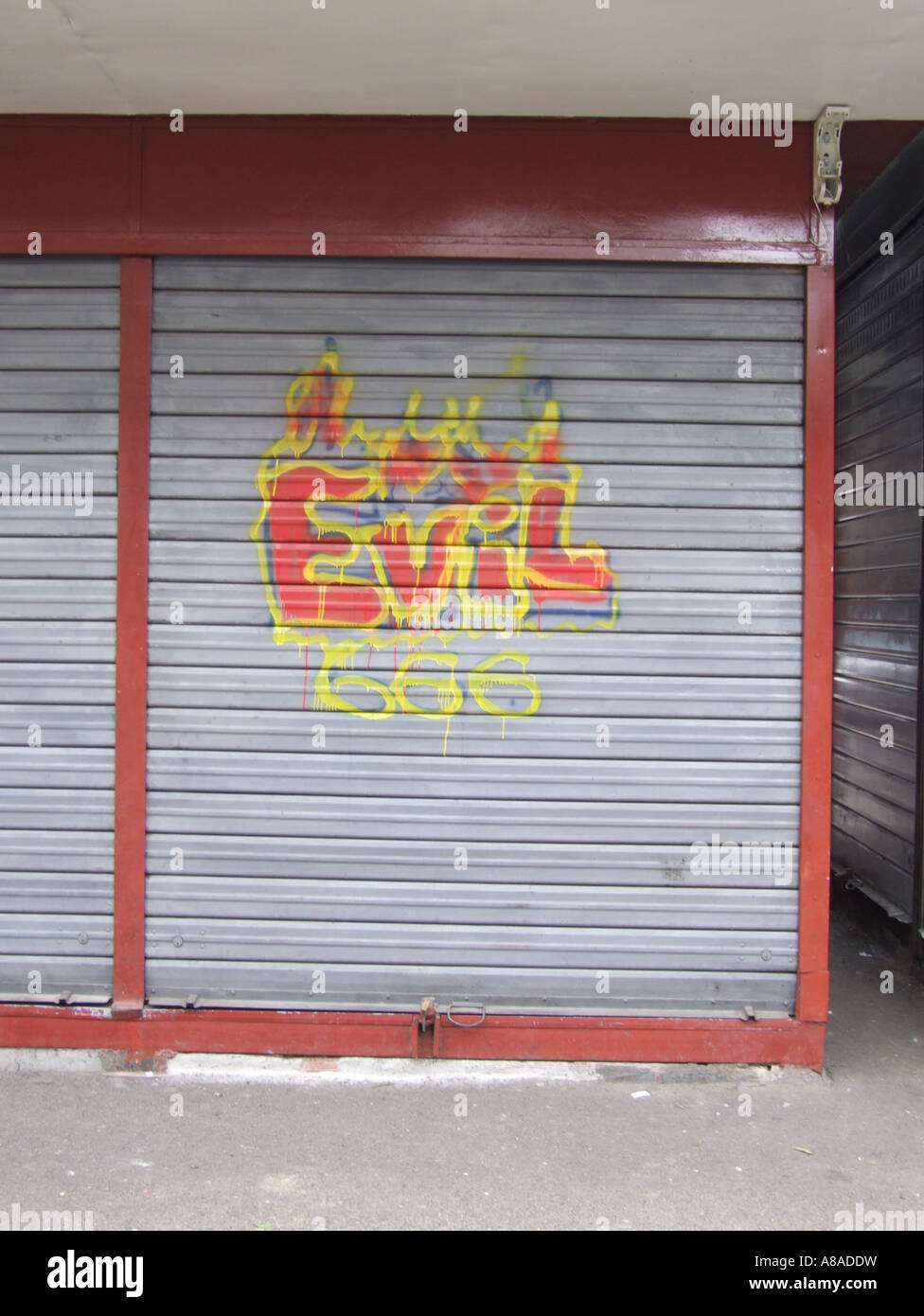 graffiti on close market stall shutter Stock Photo - Alamy