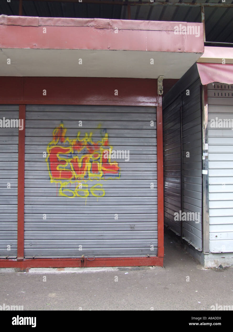 graffiti on close market stall shutter Stock Photo - Alamy