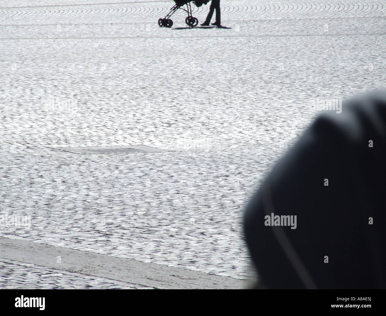 shadow of person pushing pram Stock Photo - Alamy