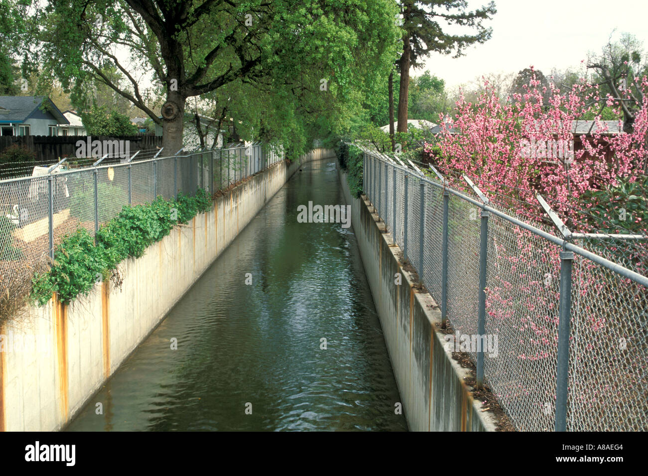 Flood control canal for stream and rainfall runoff in residential area ...