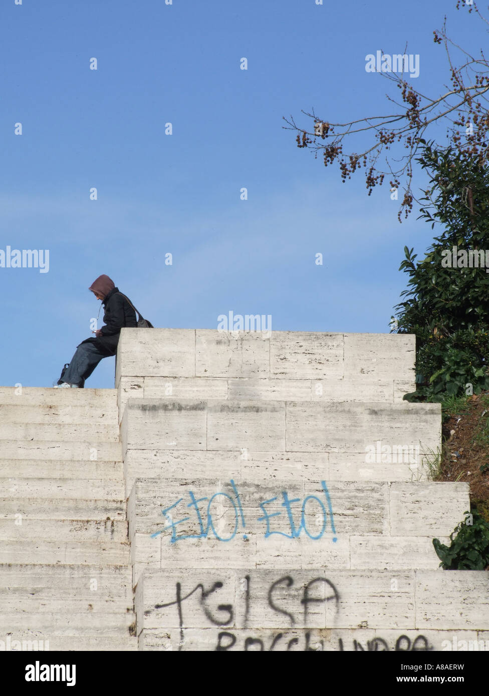 Homeless man sitting on steps hi-res stock photography and images - Alamy