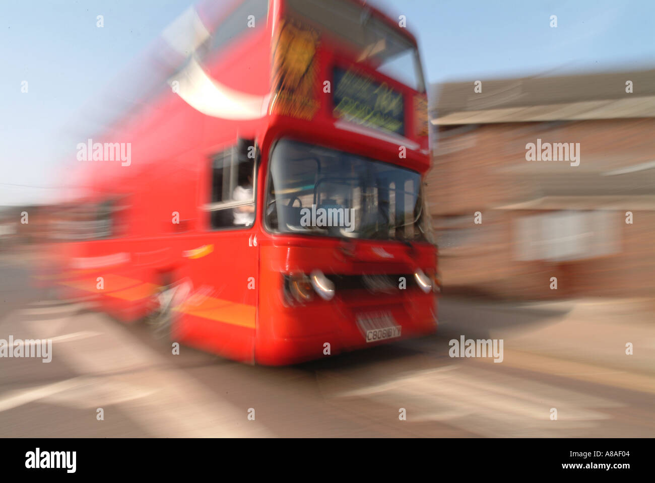 moving red bus double decker motion blur concept Stock Photo - Alamy