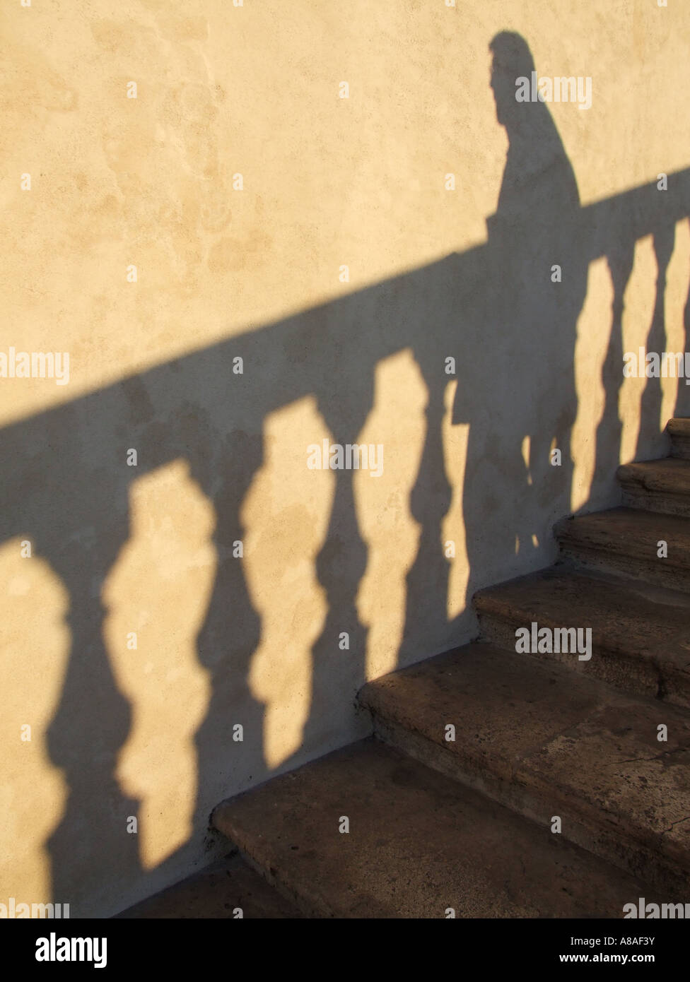 Person shadow mystery man woman walk up wall hi-res stock photography ...