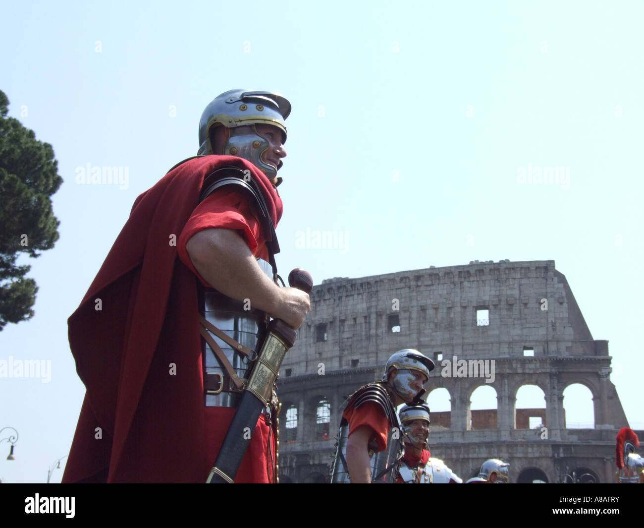 Roman soldiers in a procession by colosseum celebrating the birth of ...