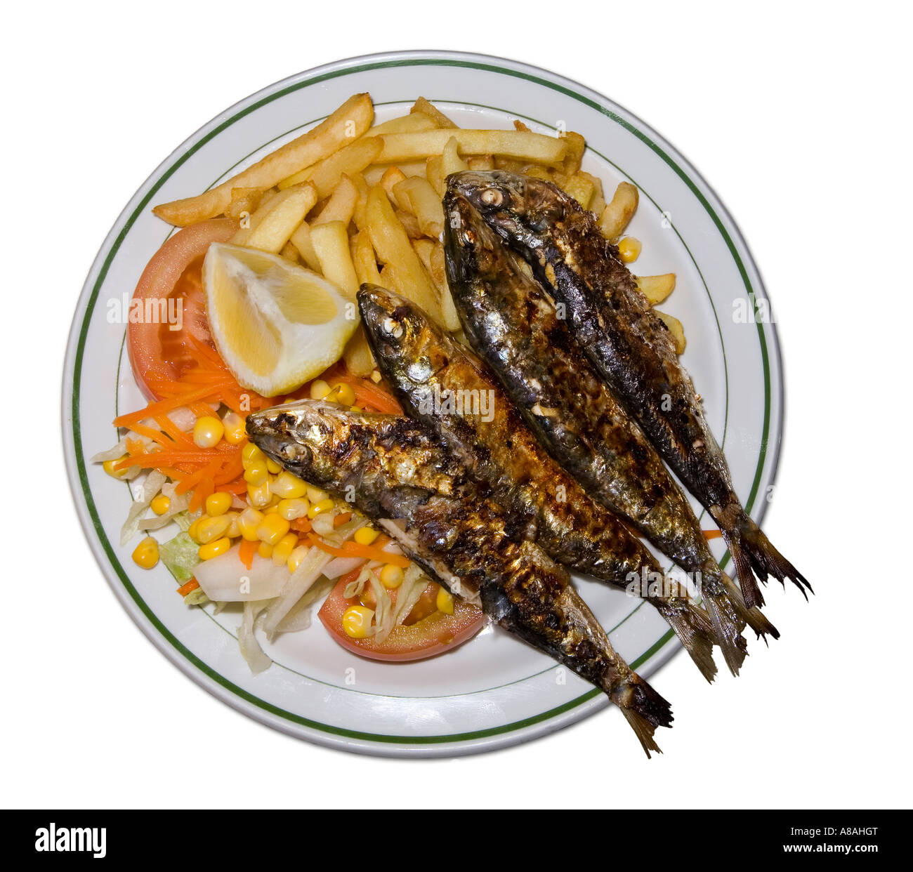 Traditional grilled sardines with chips and salad Spain Stock Photo - Alamy