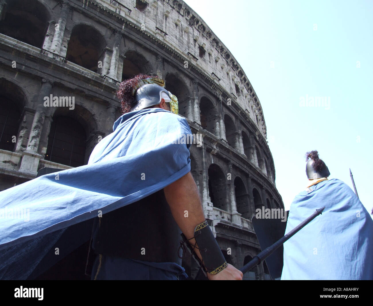 Roman soldiers in a procession by the colosseum celebrating the birth ...