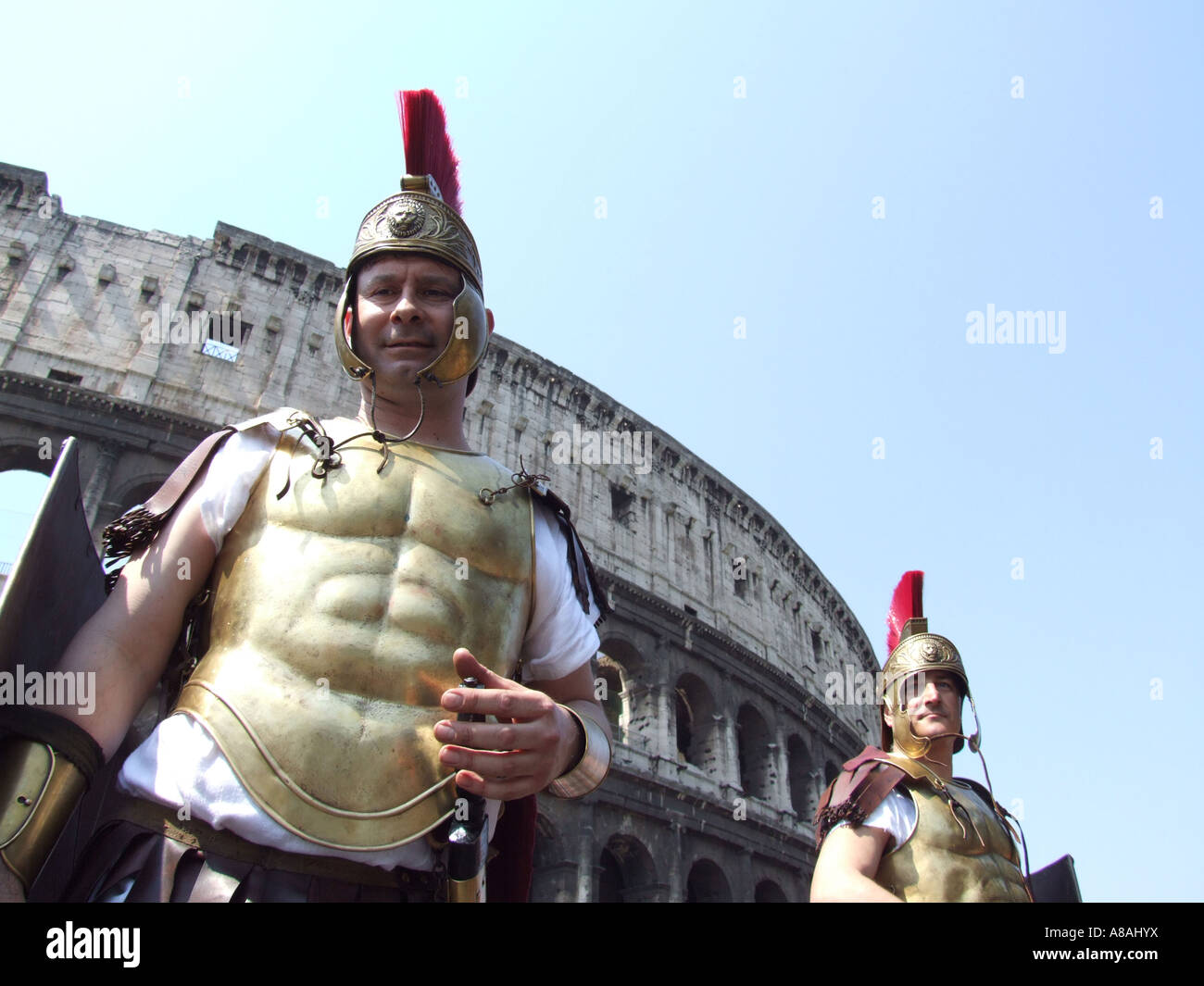 Roman soldiers in a procession by the colosseum celebrating the birth ...