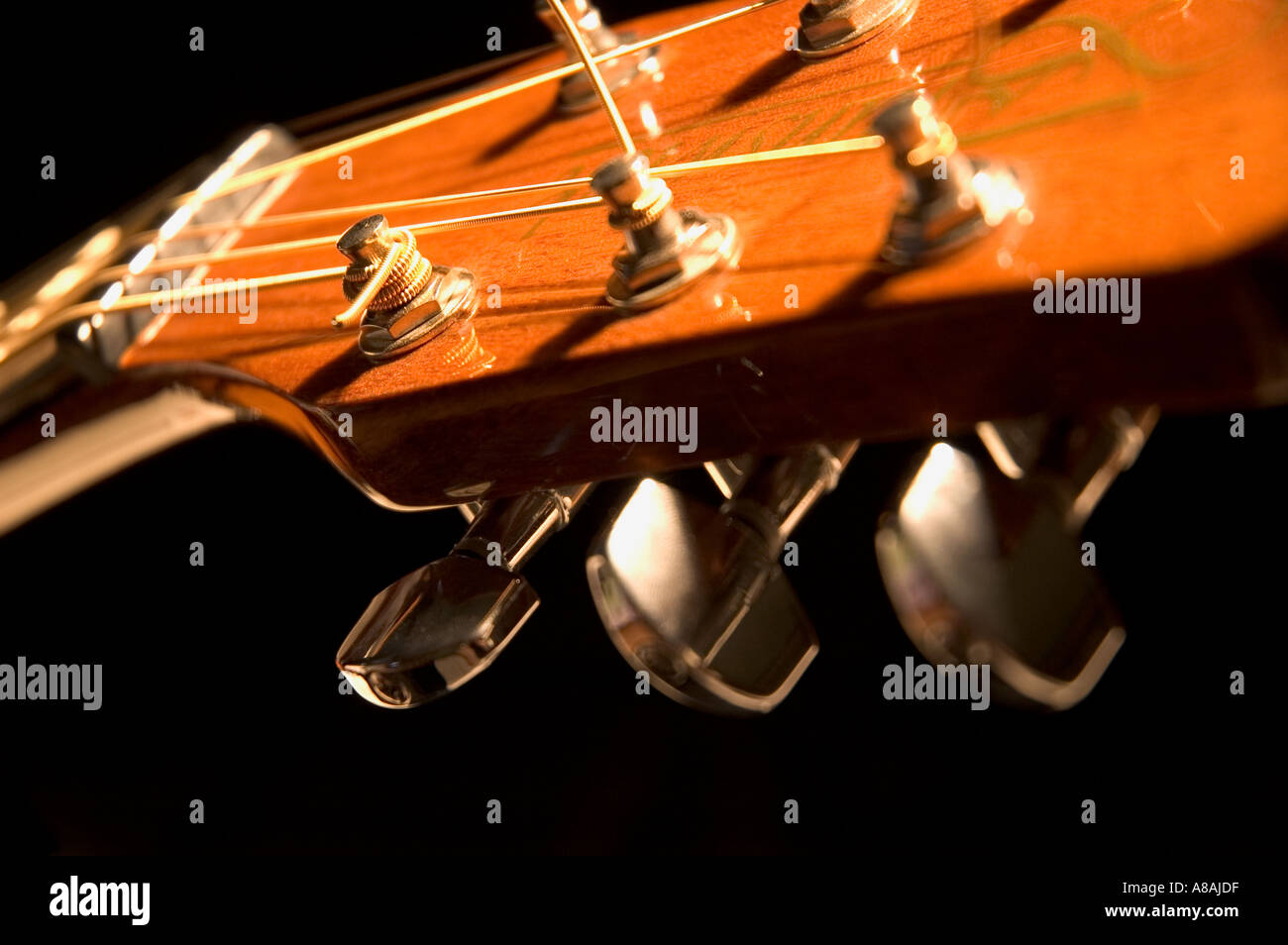 Acoustic guitar head and tuning keys close up Stock Photo - Alamy