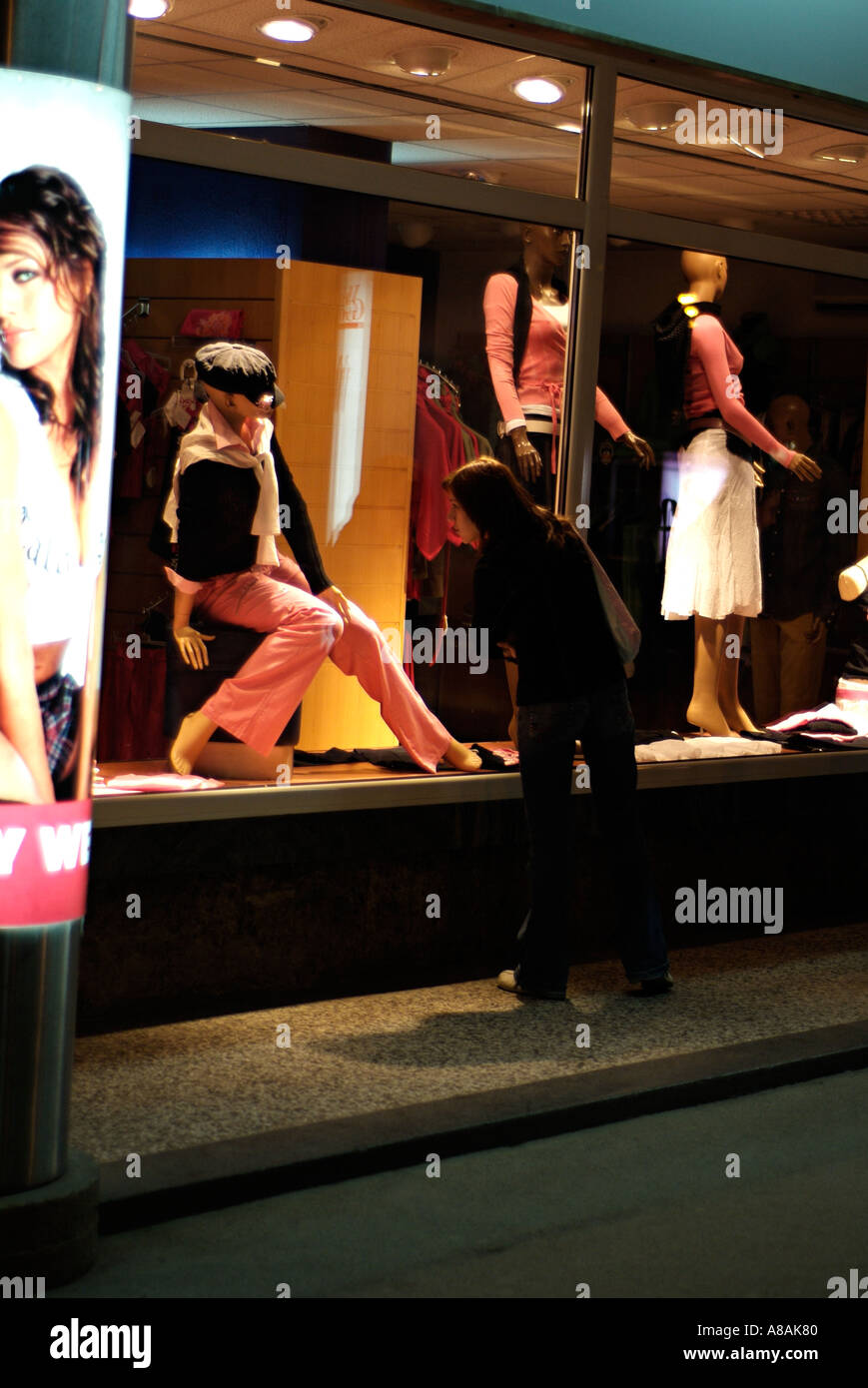 Young Woman Window Shopping Stock Photo - Alamy