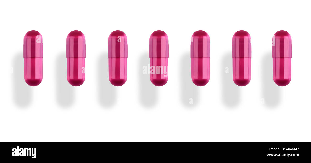tablets caps in a row Tabletten Kapseln in einer Reihe Stock Photo - Alamy